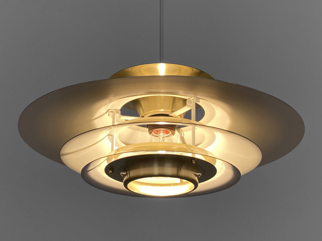 Layered pendant light in brushed golden aluminum by Frandsen lighting ...